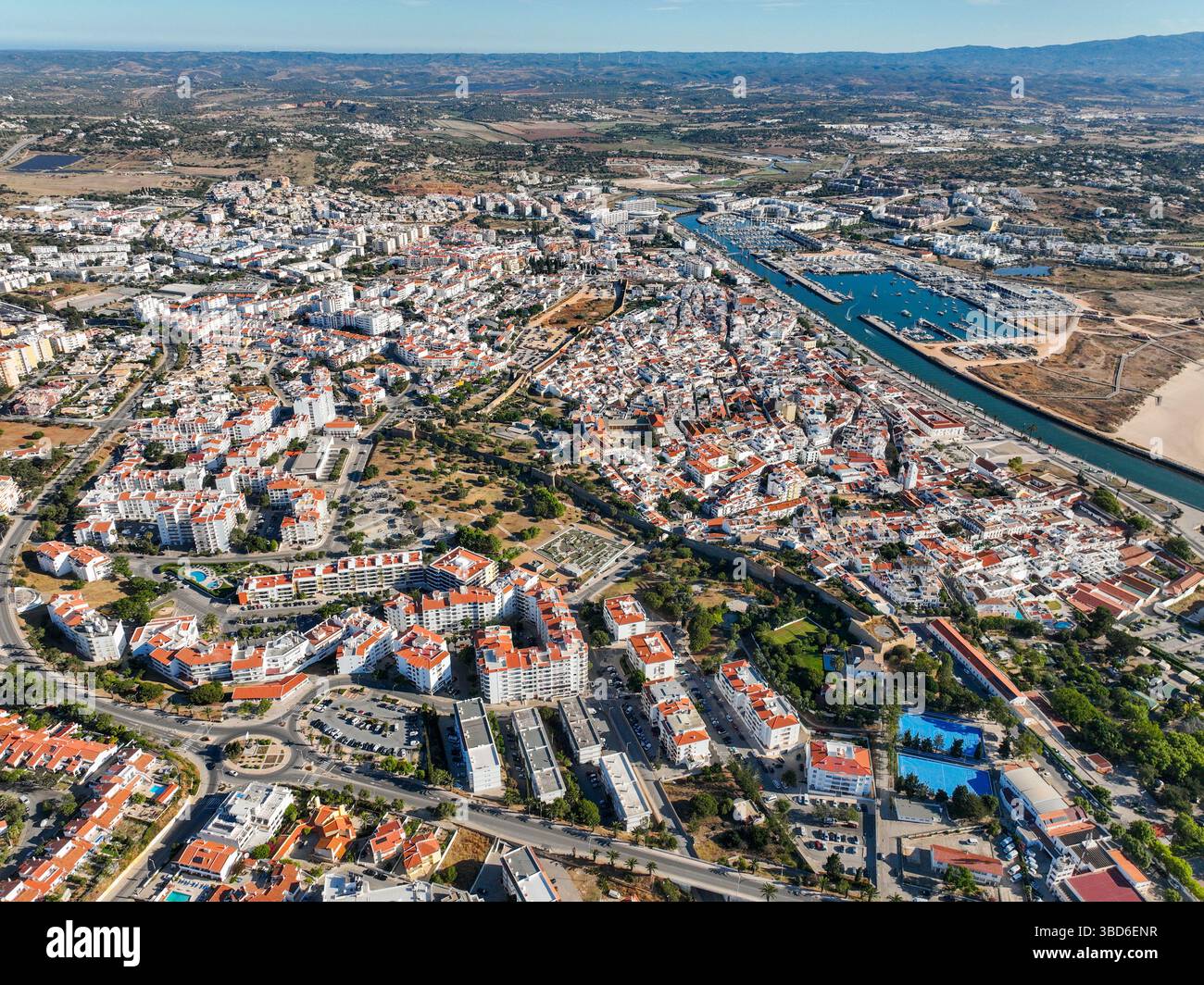 Aerial view of Lagos, Portugal showing the marina, historic center, and ...
