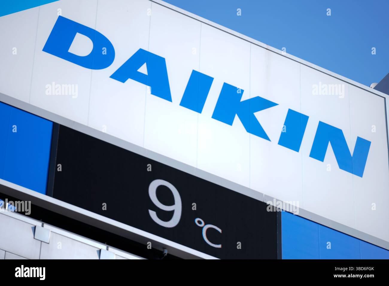 This photo shows a logo of Daikin Industries in a billboard with a ...