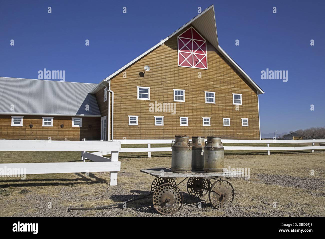 Traditional Mennonite dairy farm with old milk churns, milk cans of ...