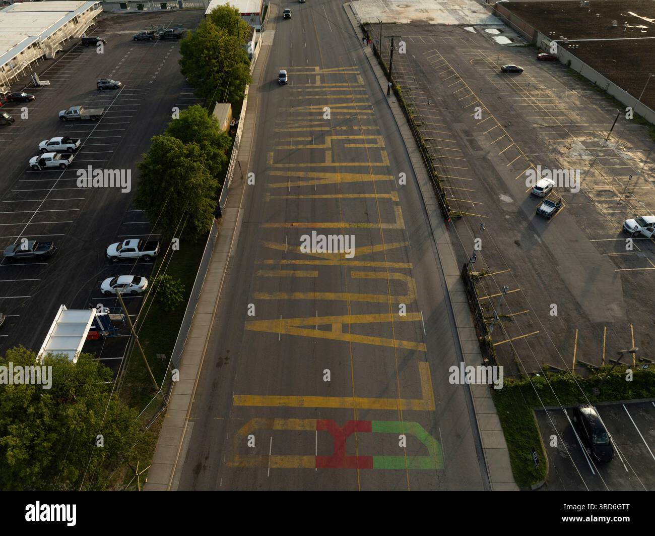 A Black Lives Matter Mural painted by Thaxton Waters II is seen in an ...