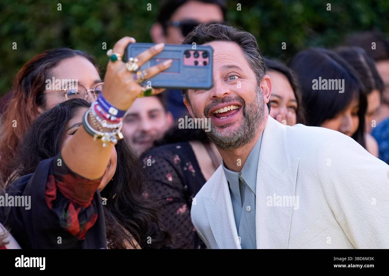 Nick Kroll, a cast member in "Big Mouth," poses for a photo with a fan at the Season 8 premiere ...