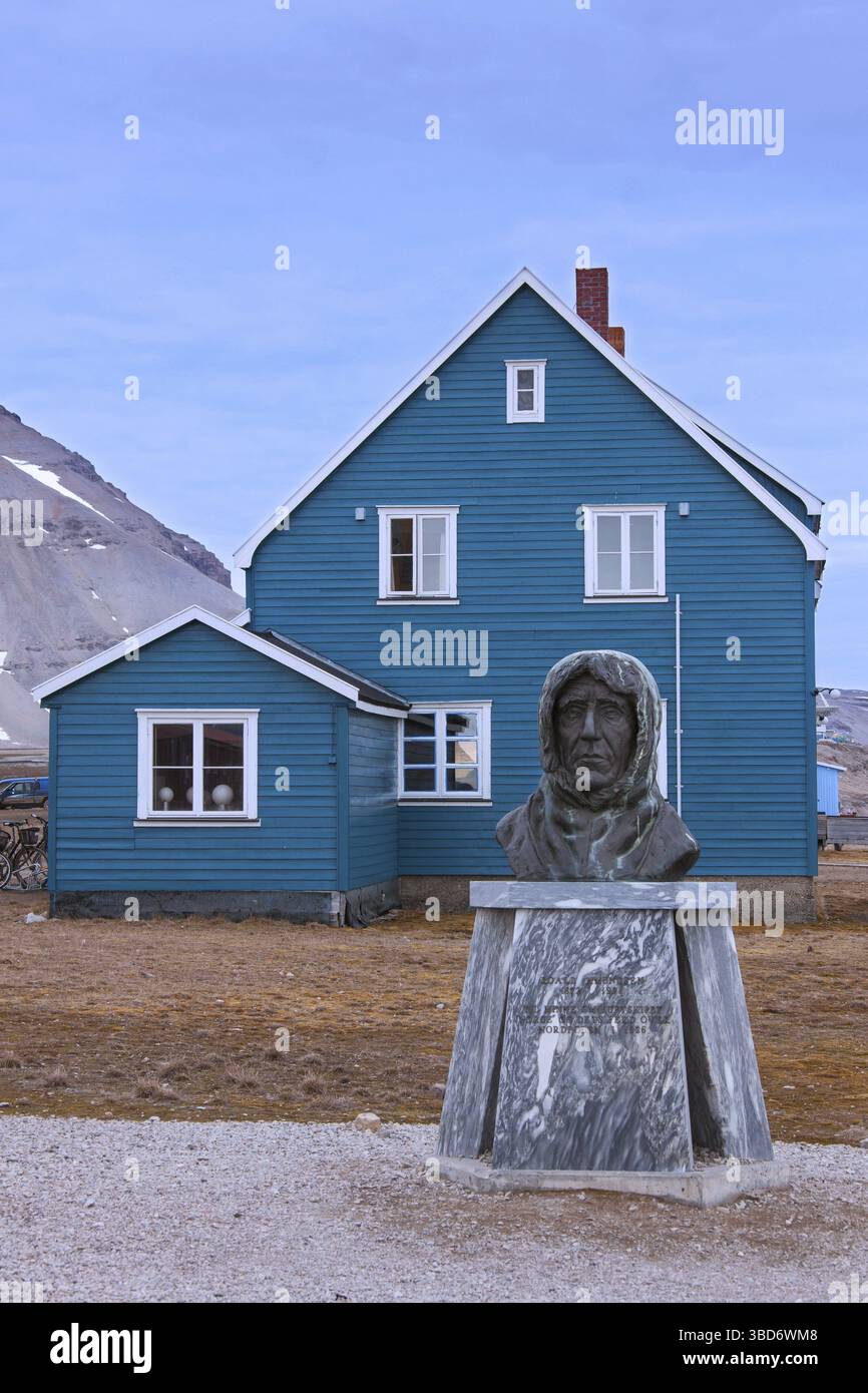 Statue of the Norwegian explorer Roald Amundsen in the remote village ...