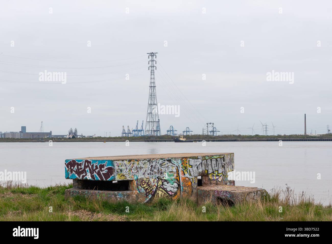 Extra tall electricity pylon on the south bank of the River Thames ...