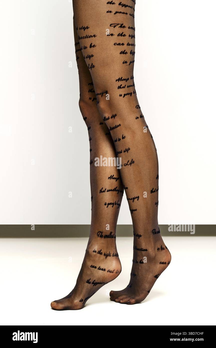 Beautiful female legs in pantyhose with inscriptions in profile Stock ...