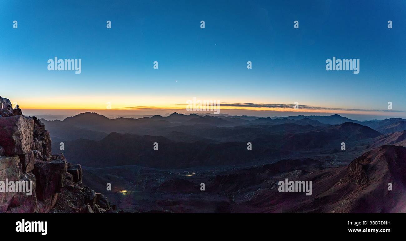 Sunrise over the Sinai desert view from mount Sinai after a long night ...