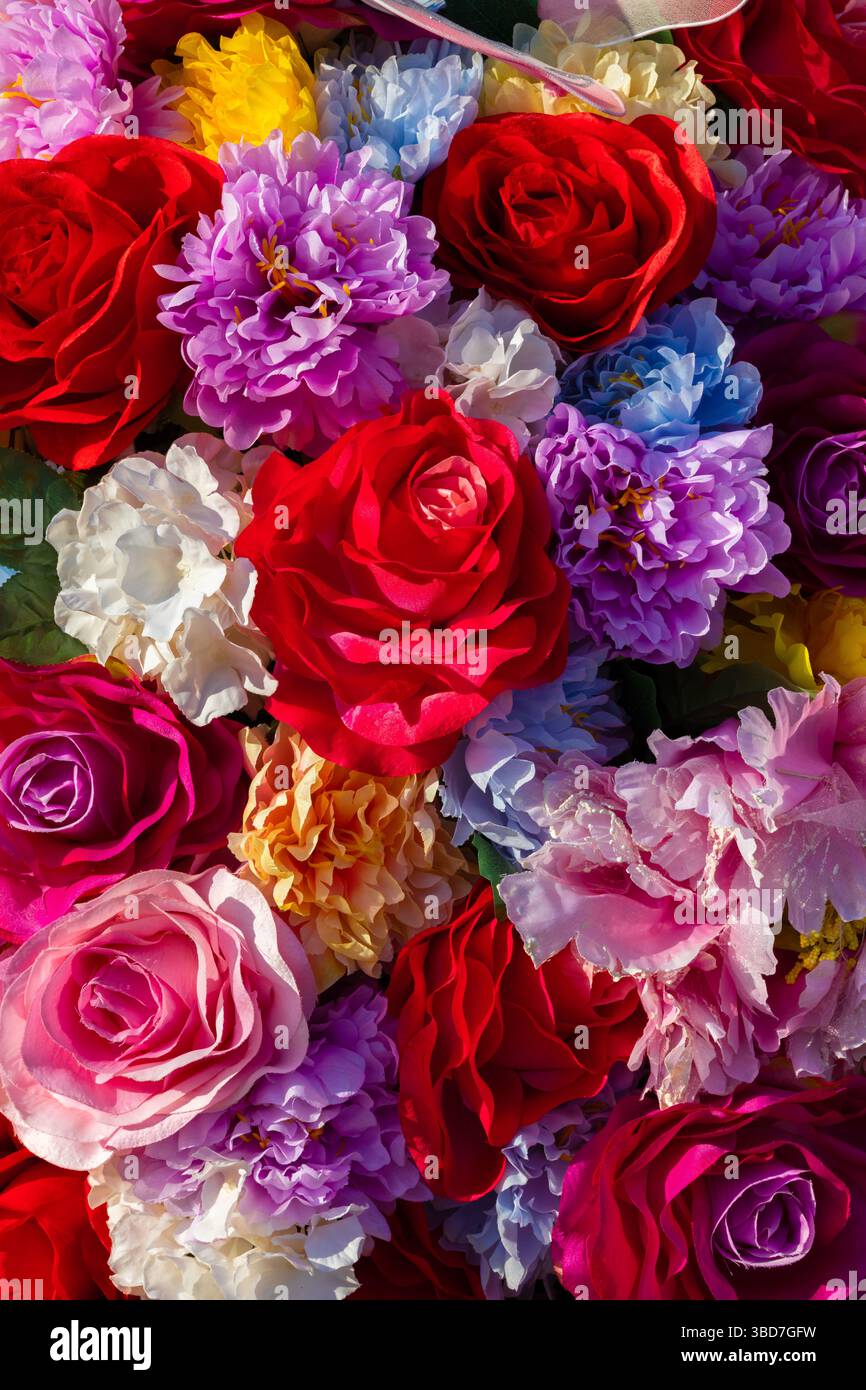 Backdrop colorful artificial flowers hi-res stock photography and ...