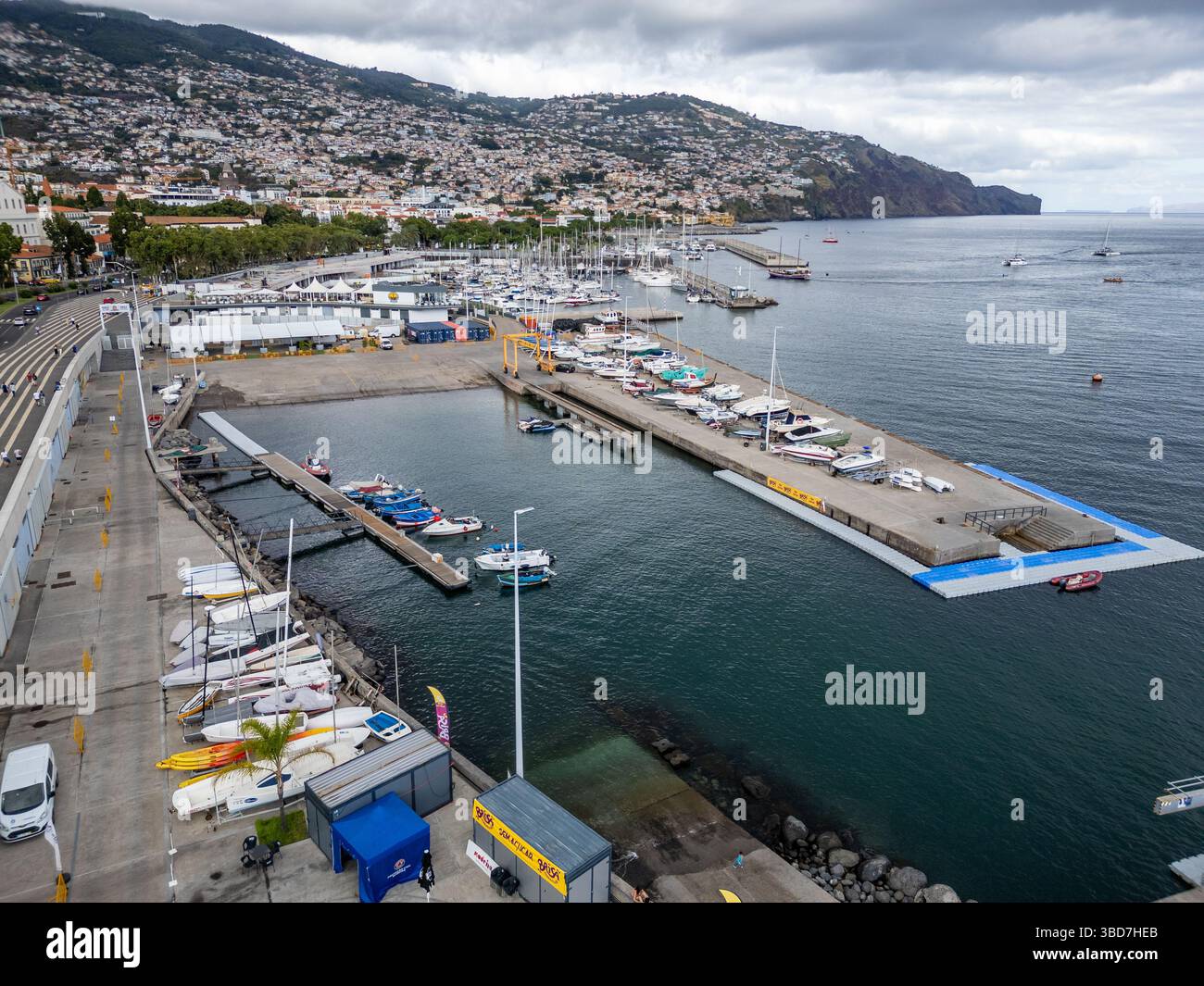 Funchal, Portugal - June 10, 2024: Aerial view of port in Funchal city ...