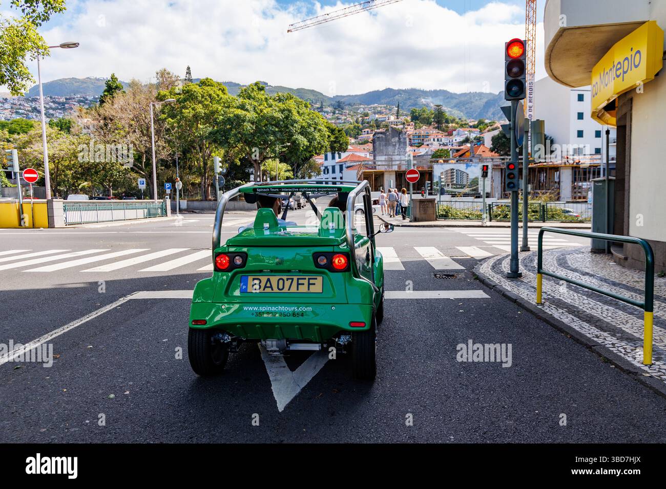 Funchal, Portugal - June 11, 2024: Spinach Tour electric car in Funchal ...
