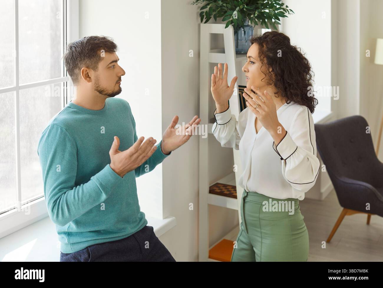 Frustrated young couple arguing, having relationship conflict ...