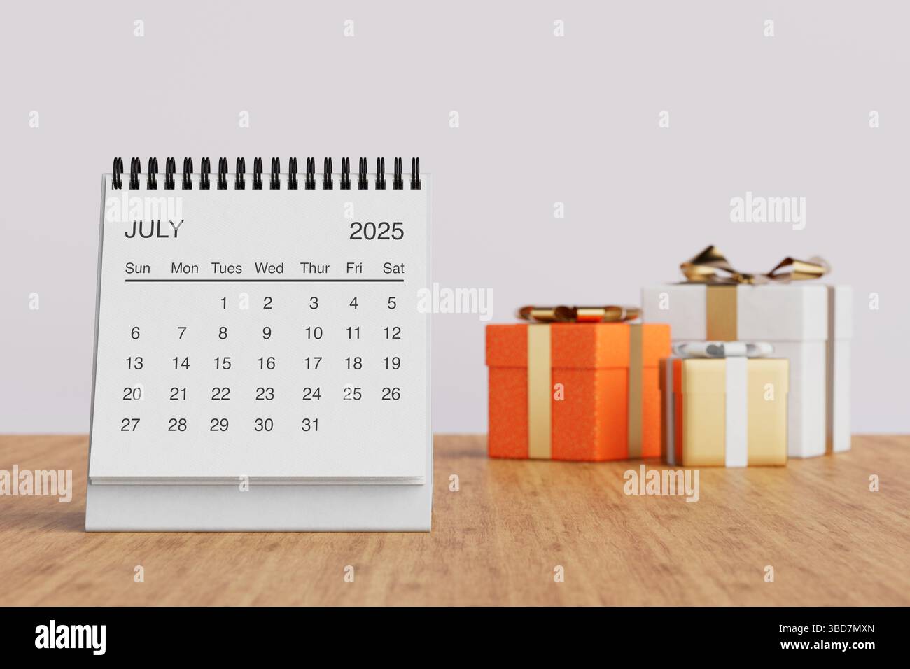White Desk Monthly July 2025 Business Calendar Near Gift Boxes on a ...