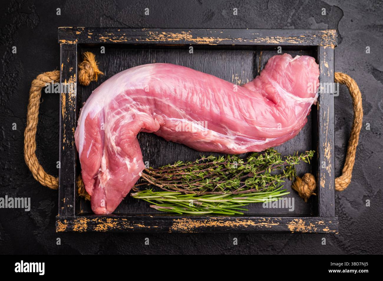 Raw pork tender cut, tenderloin featuring a smooth texture, perfect for ...