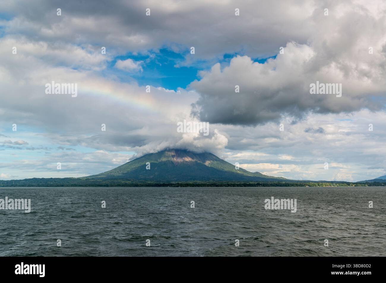 View from Lake Nicaragua on volcano Concepcion with rainbow and heavy ...