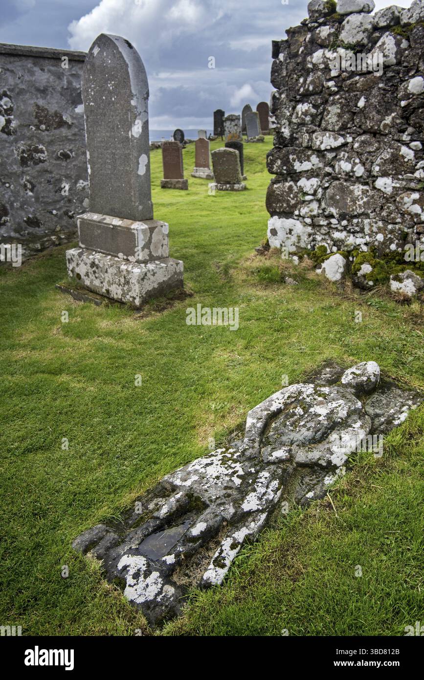 Stone grave slab of Angus Martin on the Kilmuir Cemetery, Isle of Skye ...