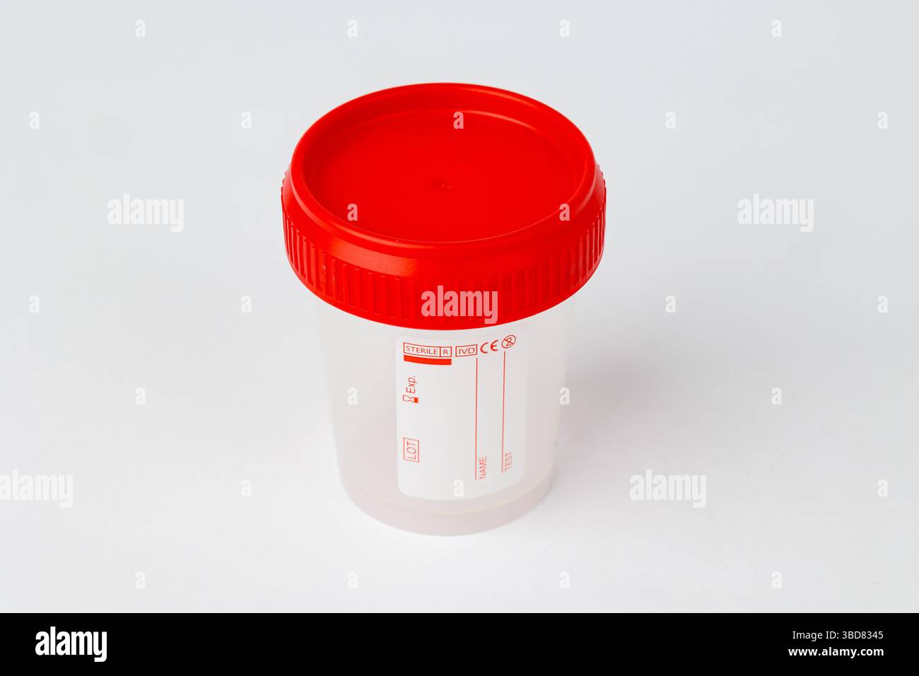 Sterile medical sample container with red lid on white background Stock ...