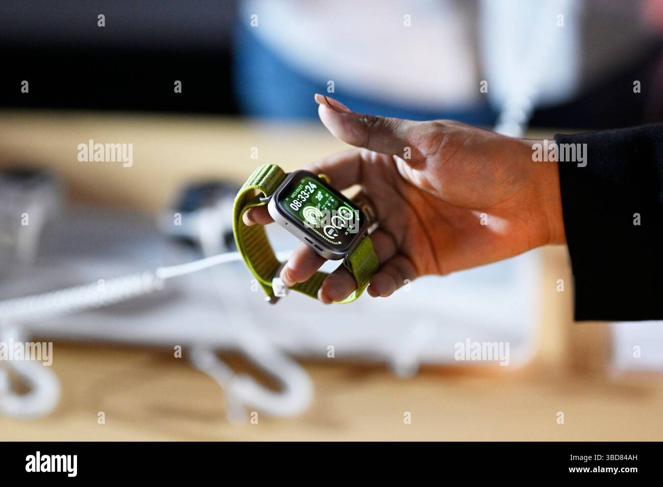 Mexico City, Mexico. 21st May, 2025. A woman views the newly-released Huawei Watch Fit 4 Pro ...