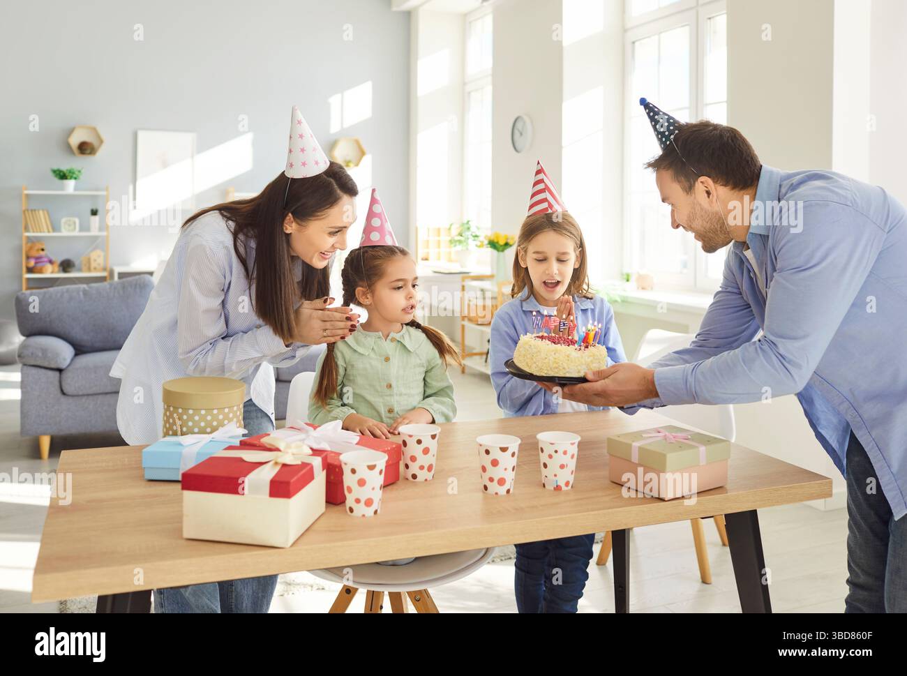 Family happy birthday funny party, overjoyed candid parents and ...