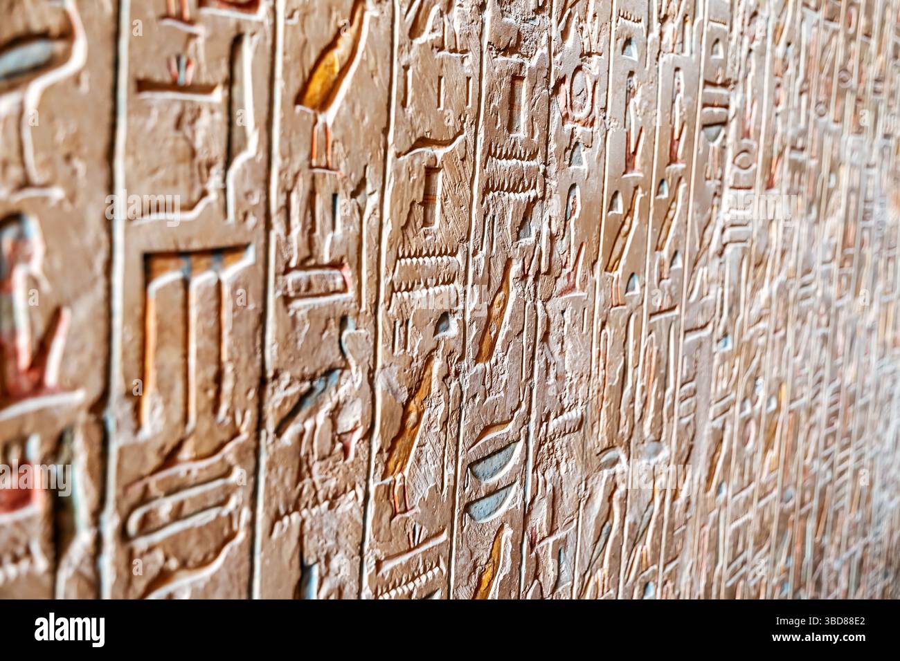 Wall covered in ancient Egyptian hieroglyphs, showcasing the intricate ...