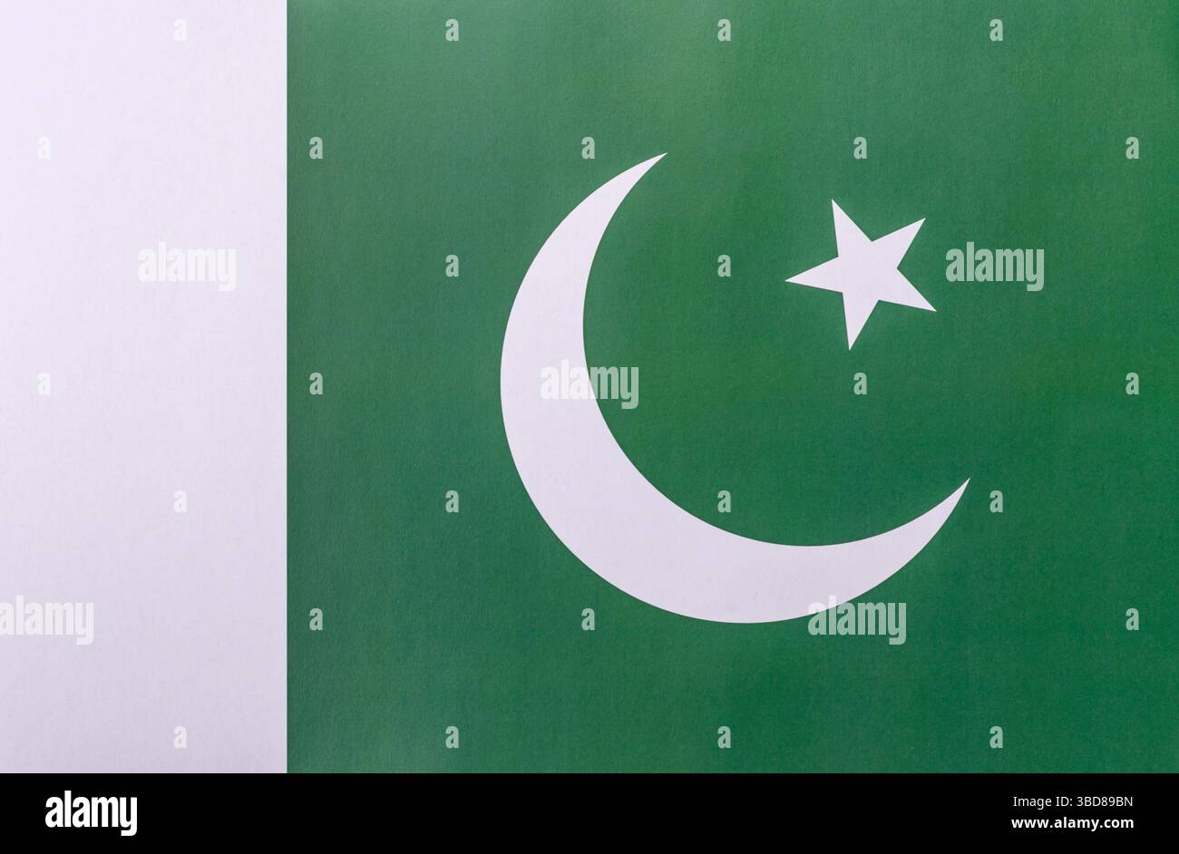 Pakistani flag, white crescent and white star on a green background ...