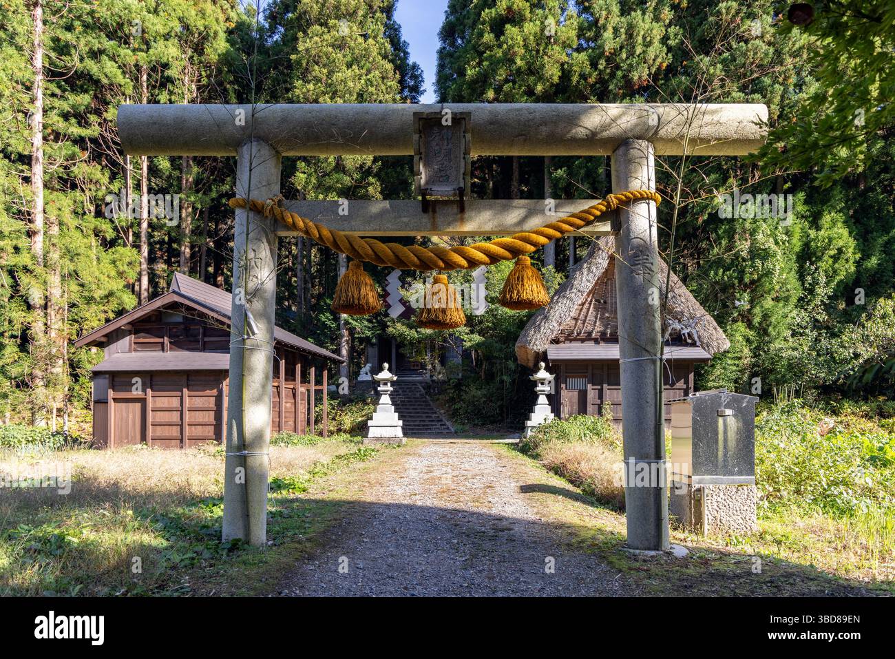 Torii gate leading to Shinmeisha Shrine in Suganuma, Toyama, Japan with ...