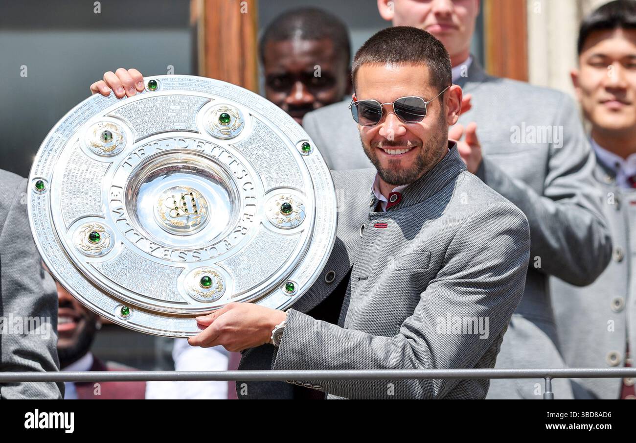MUNICH, GERMANY - MAY 18: Raphael Guerreiro of Bayern Muenchen with the ...