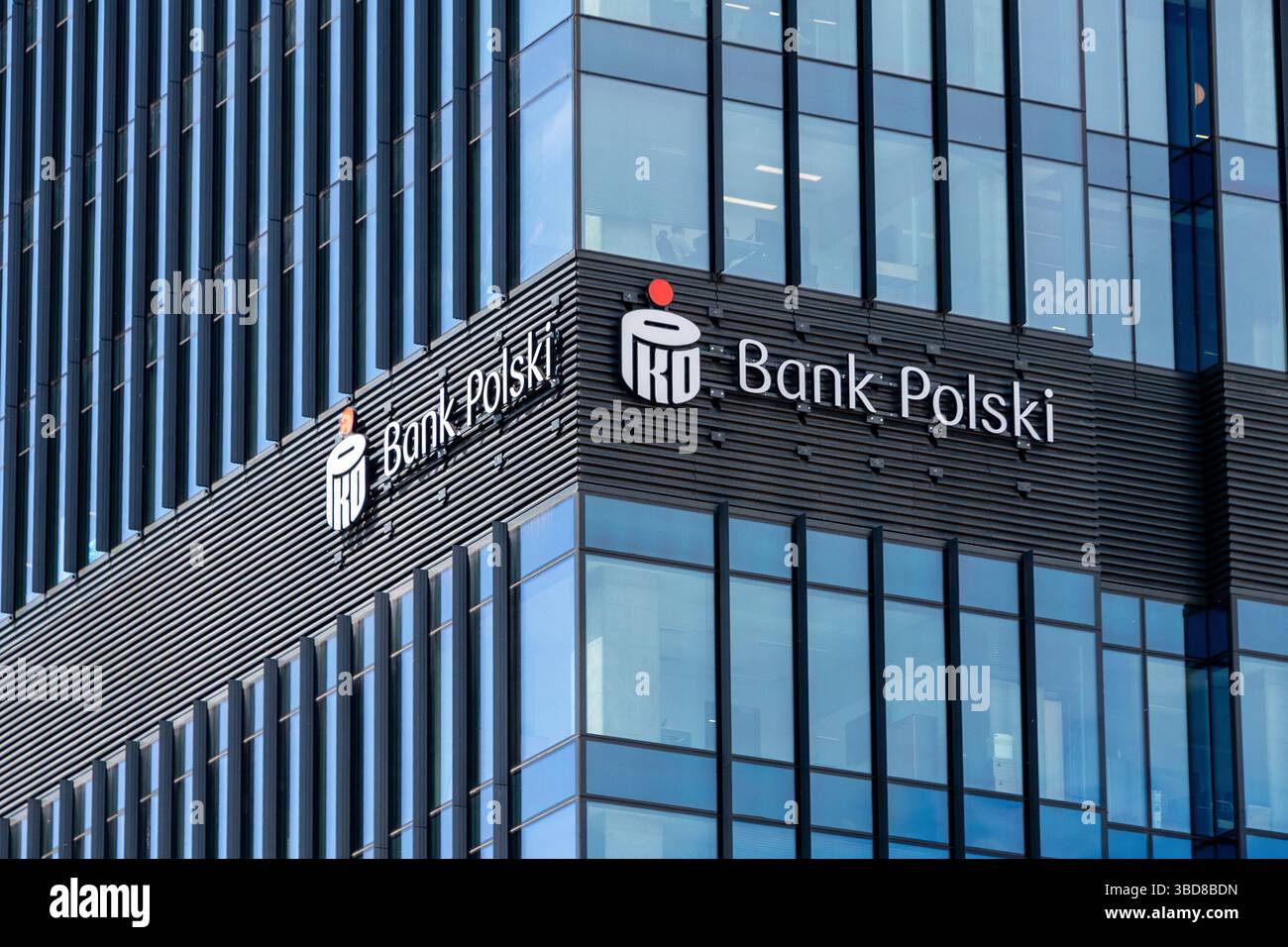 Modern skyscraper with pko bank polski logo on glass facade in urban ...