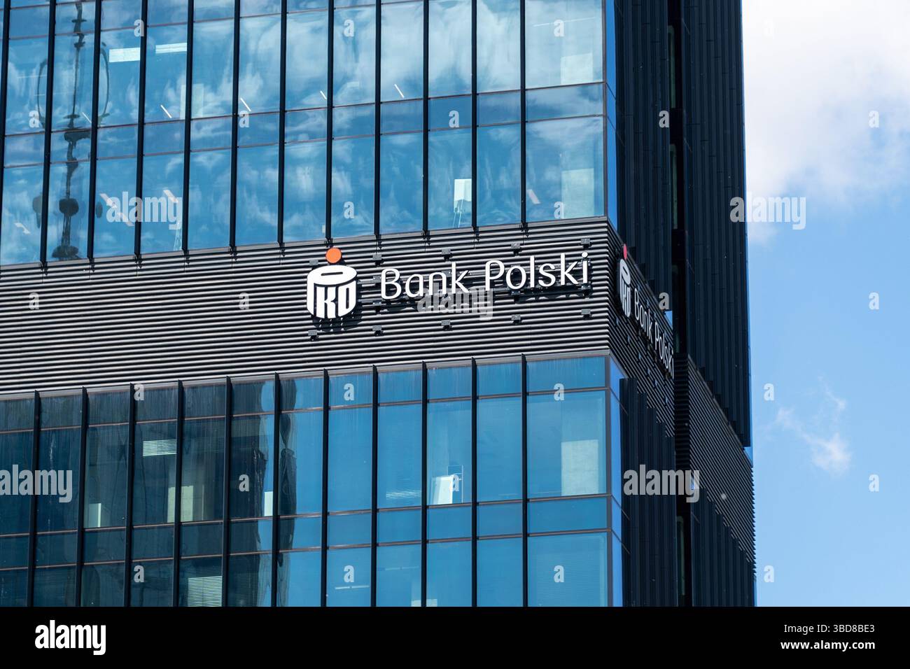 Modern glass building featuring pko bank polski logo. Warsaw, Poland ...
