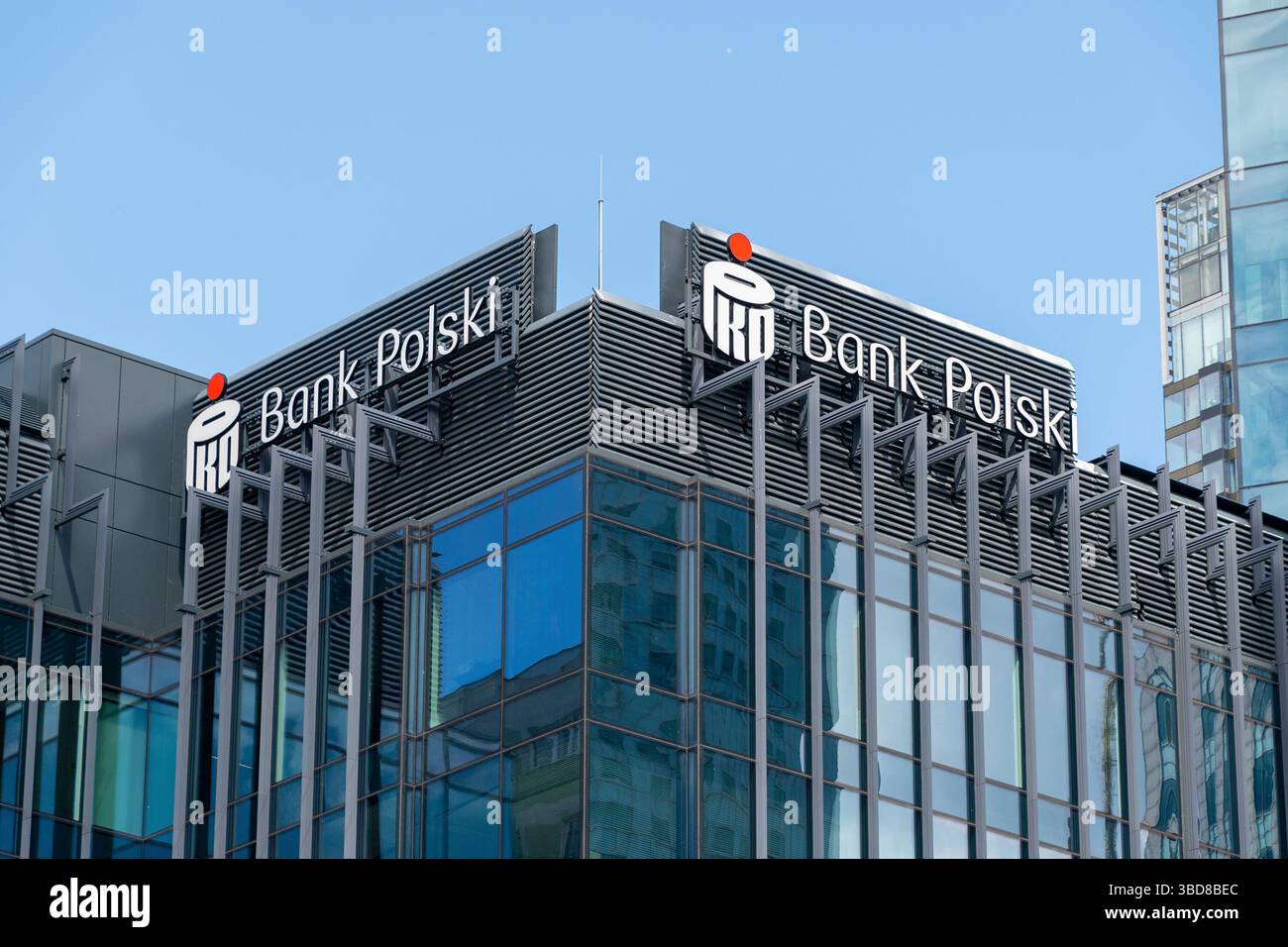 Modern glass building with pko bank polski signage. Warsaw, Poland. May ...
