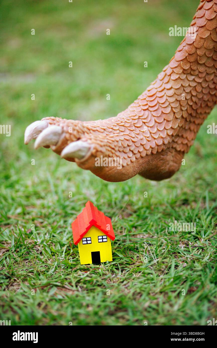 Monster foot close to crushing House Stock Photo - Alamy