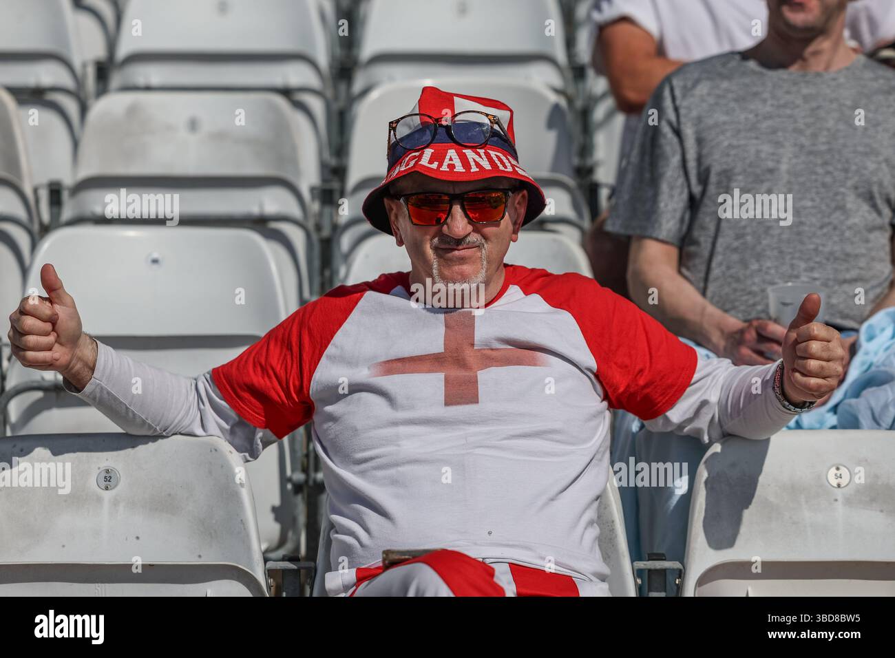 An England fan dressed up with a St Georges flag outfit during the ...