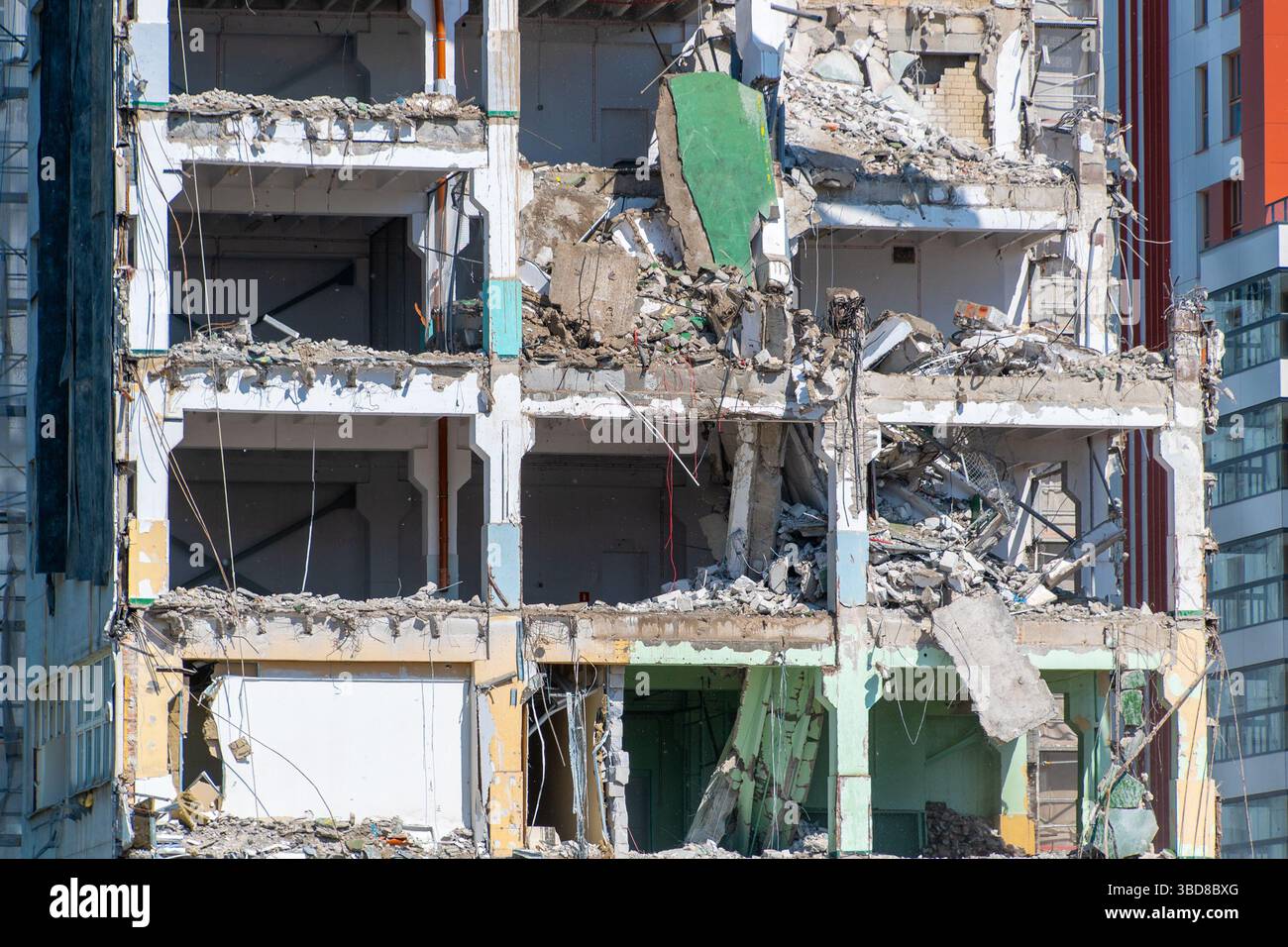 Urban building demolition: multi-story structure in destruction process Stock Photo - Alamy