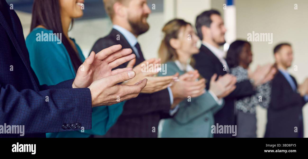 Employees close up applauding, standing thanking, excited mature team ...