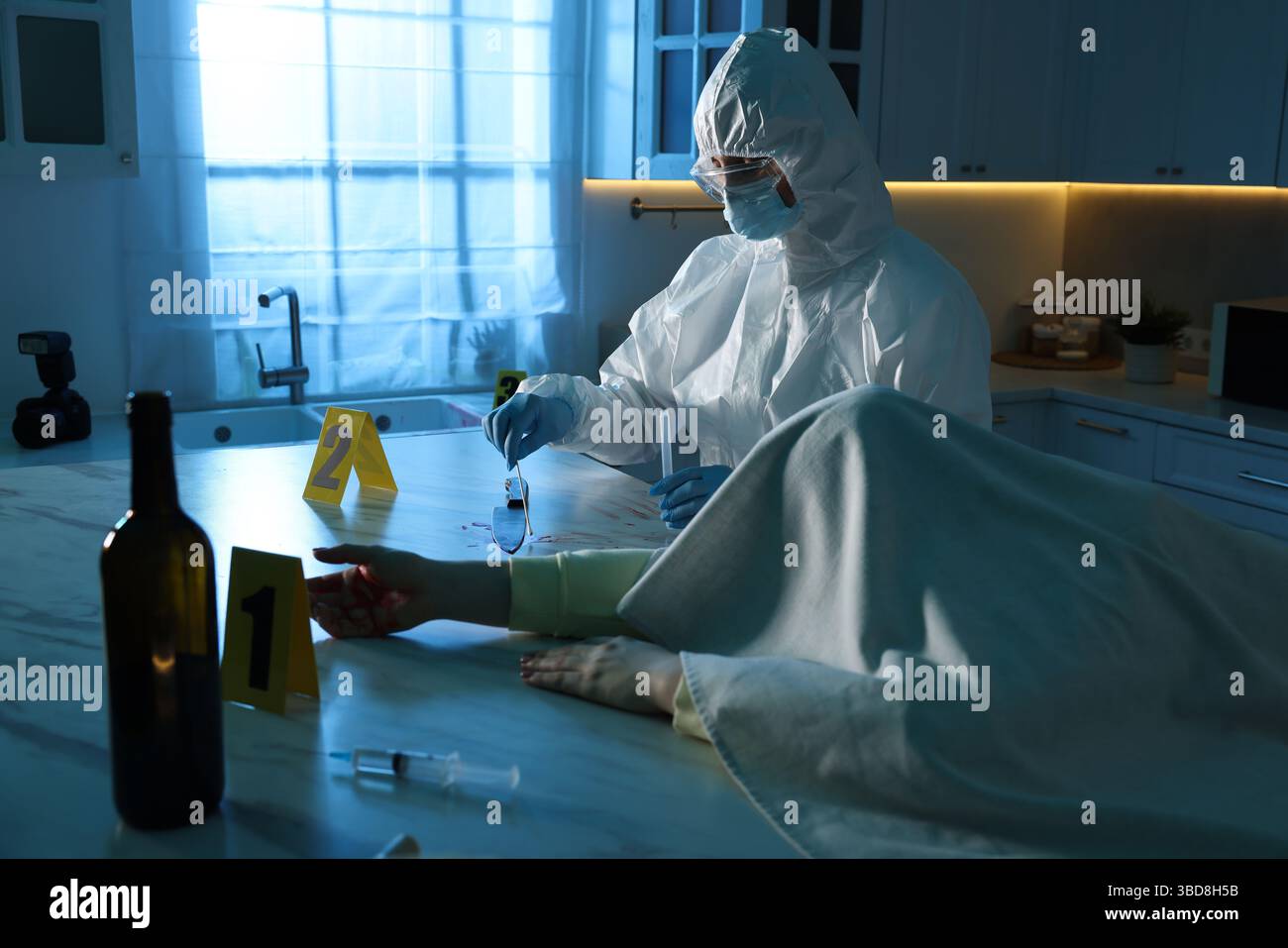 Forensic expert taking blood sample and dead woman's body at countertop ...