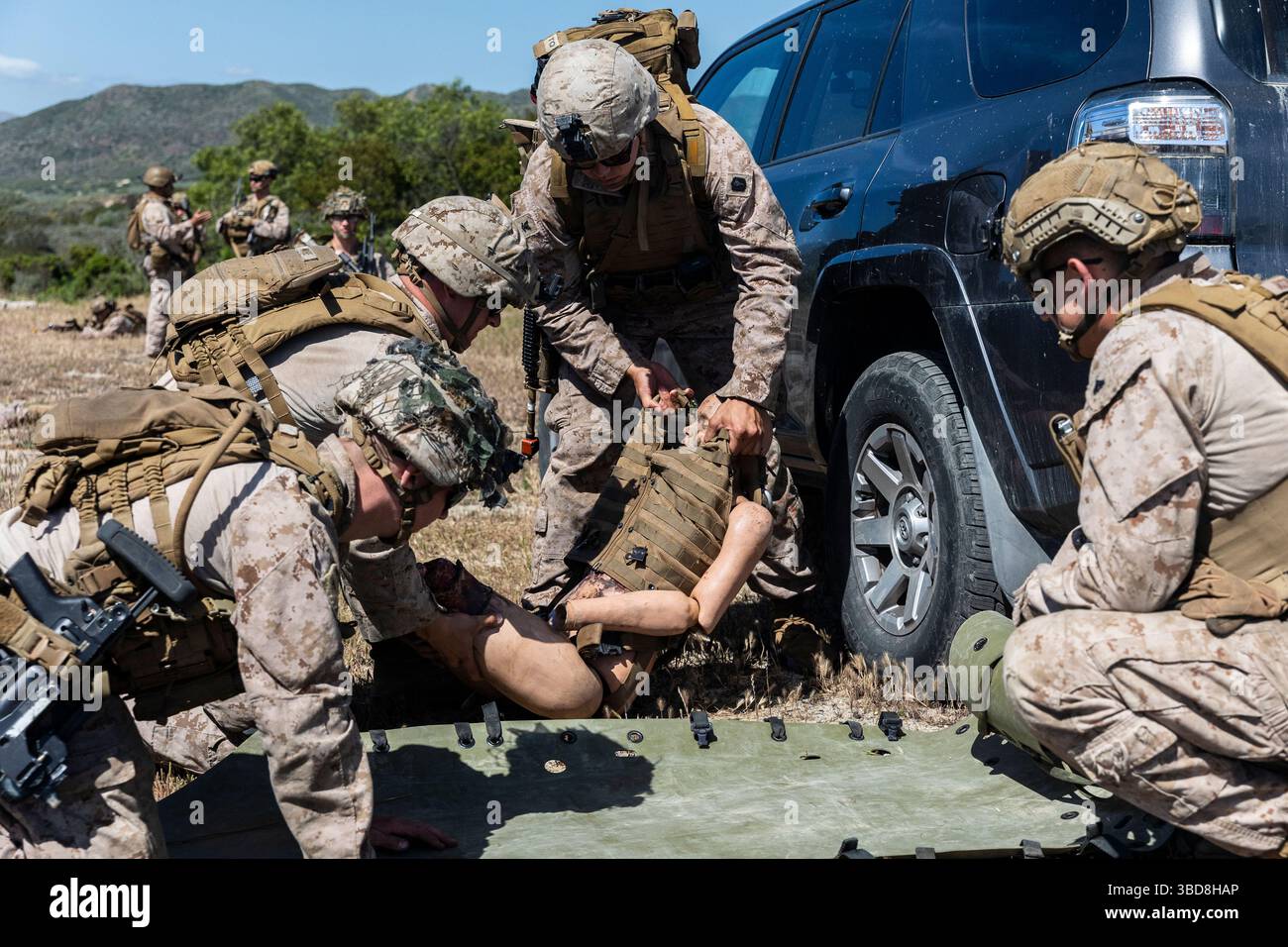 U.S. Marines with 3rd Battalion, 1st Marines, 1st Marine Division, load ...