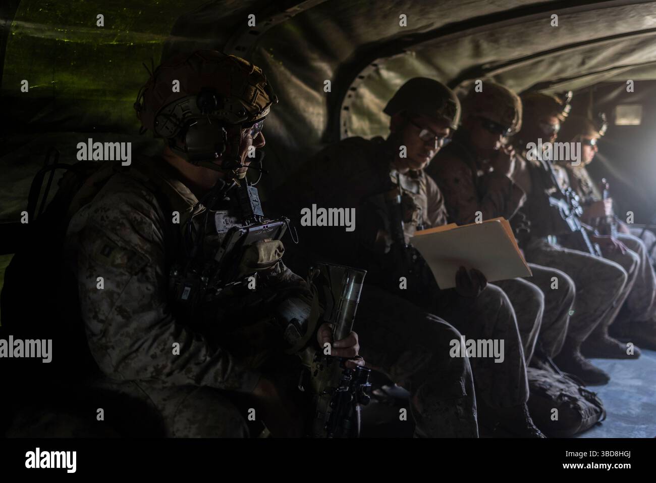 U.S. Marines with 3rd Battalion, 1st Marines, 1st Marine Division, ride ...