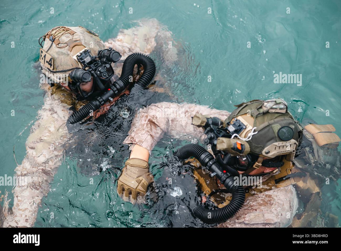 A U.S. Marine and Sailor both with 2d Force Reconnaissance Company, 2d ...