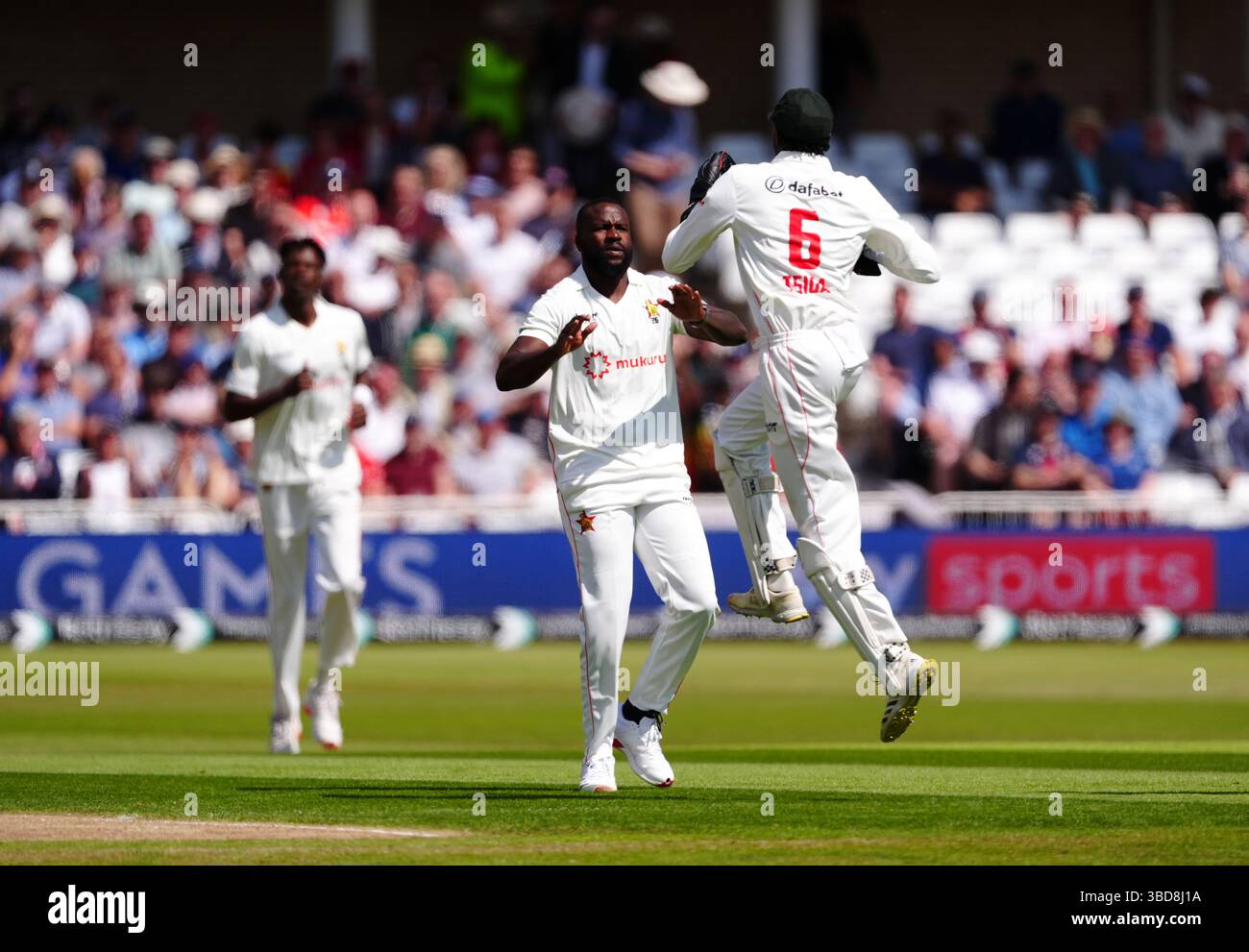 Zimbabwe's Tanaka Chivanga celebrates the wicket of England's Ollie ...