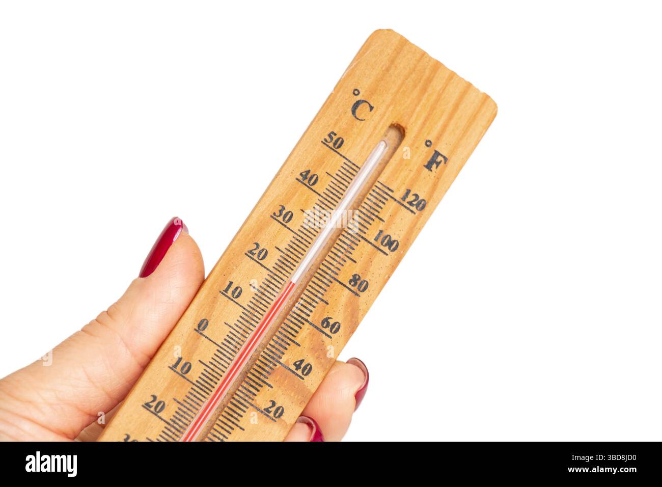Wooden thermometer in woman's hand with high temperature on white ...