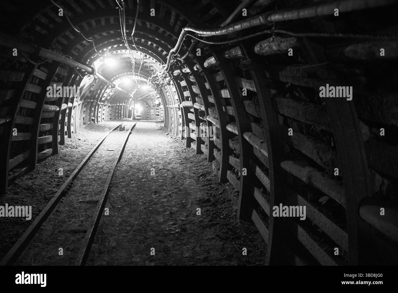 a deep underground walkway and a coal wall in a Polish coal mine Stock ...