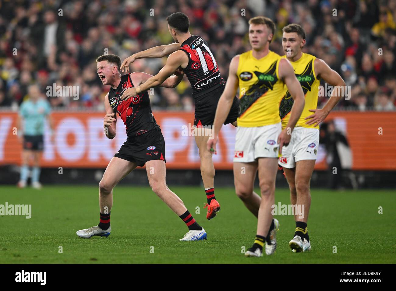 Melbourne, Australia. 23rd May, 2025. Angus Clarke of Essendon (left ...