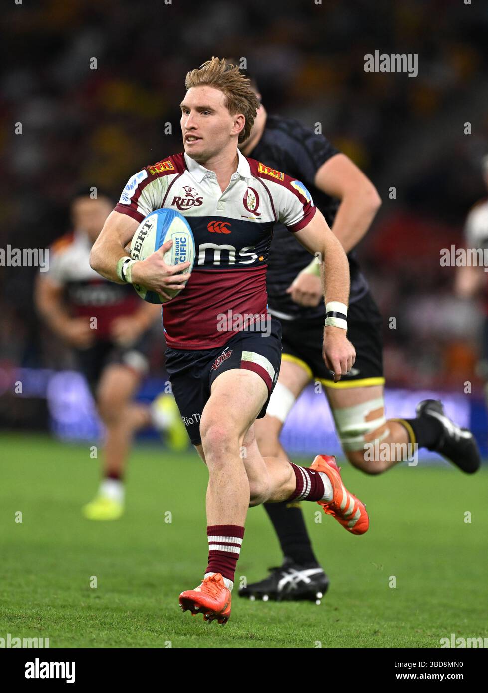 Brisbane, Australia. 23rd May, 2025. Tate McDermott of the Reds scoring ...