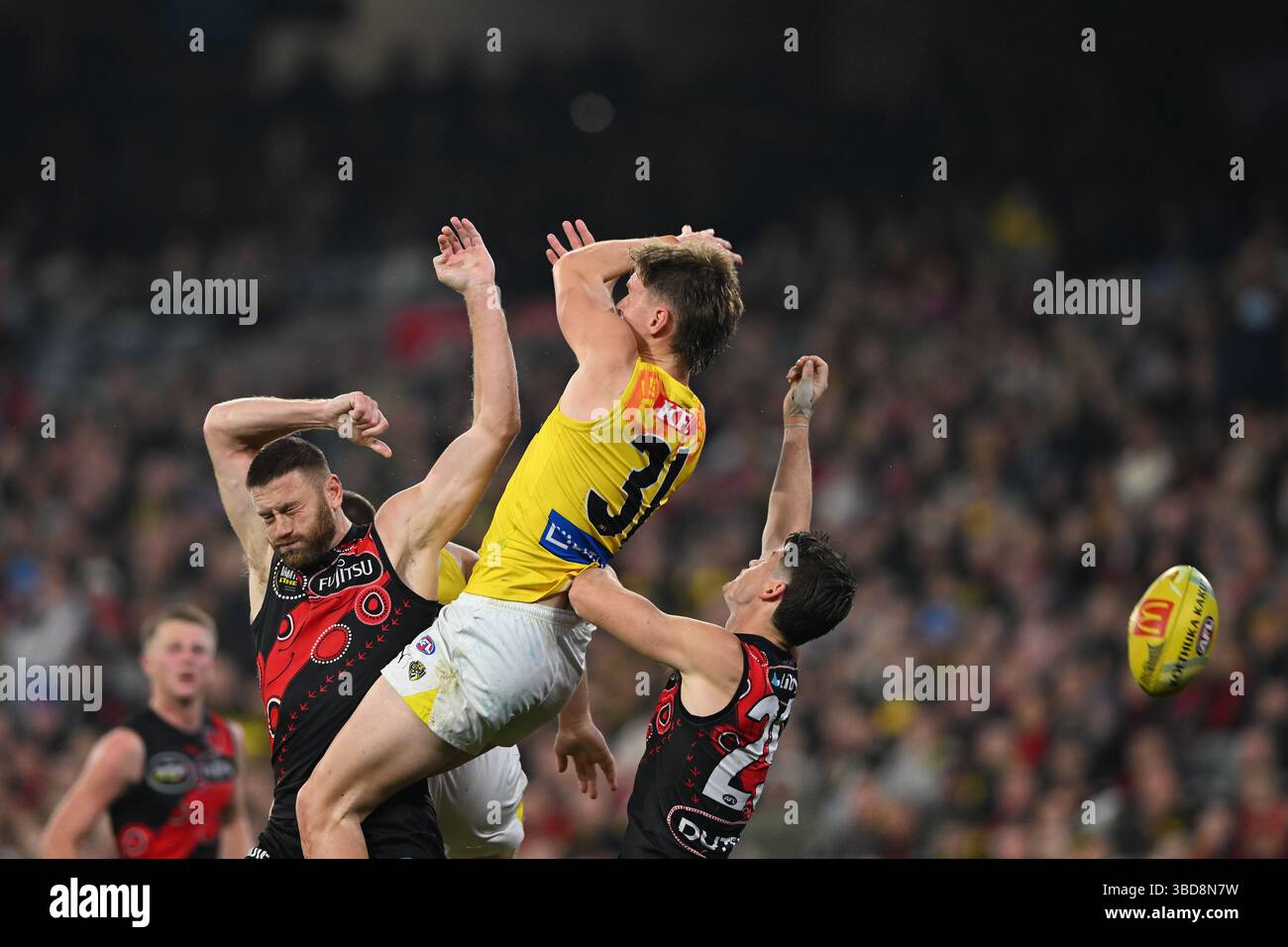 Melbourne, Australia. 23rd May, 2025. Jayden Laverde of Essendon (left ...