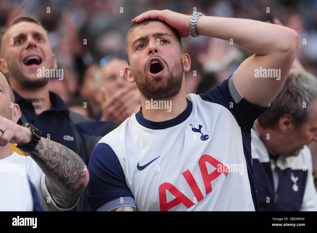 Tottenham Hotspur fans watch a screening of the UEFA Europa League ...