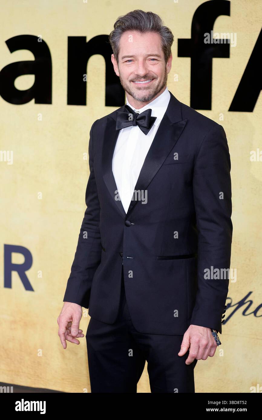 Ian Bohen arrives at the 31st amfAR Cannes Gala during the 78th Annual ...
