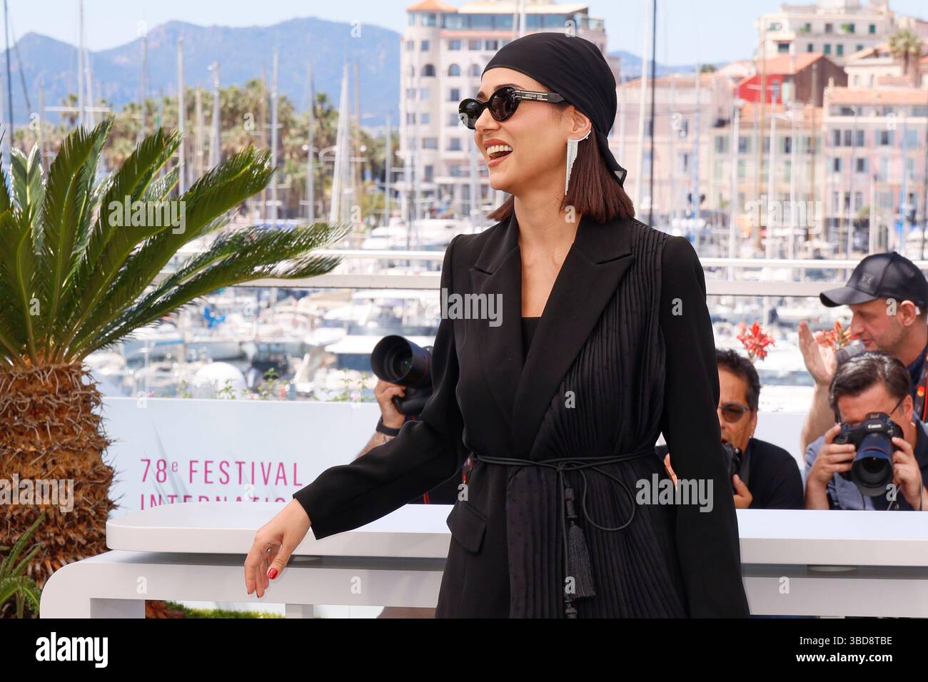 Parinaz Izadyar poses for photographers at the photo call for the film 'Woman and Child' at the ...