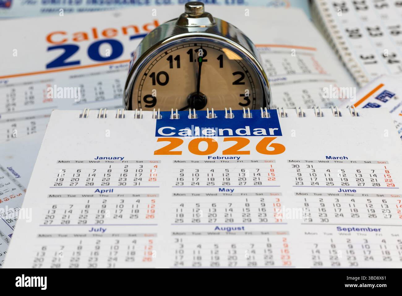 2026 calendar with clock. Yearly time and schedule concept Stock Photo ...