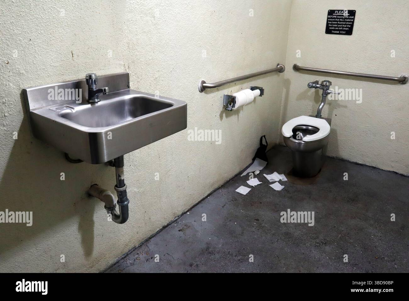 Interior of Public Restroom with Stainless Steel Fixtures and ...