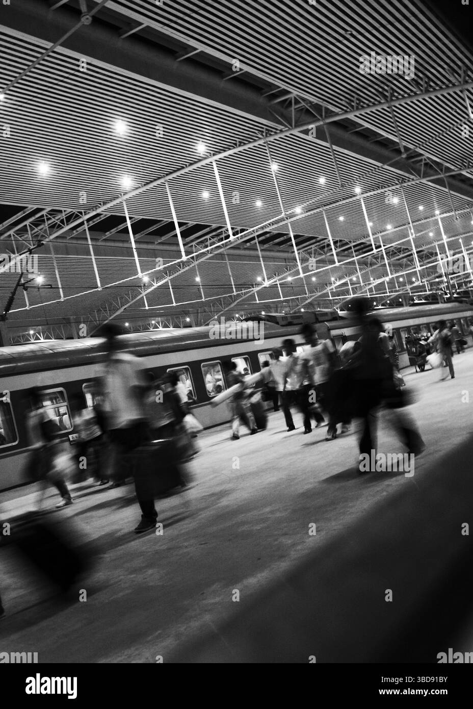Motion-Blurred Commuters at a 2010s Chinese Train Station Platform ...
