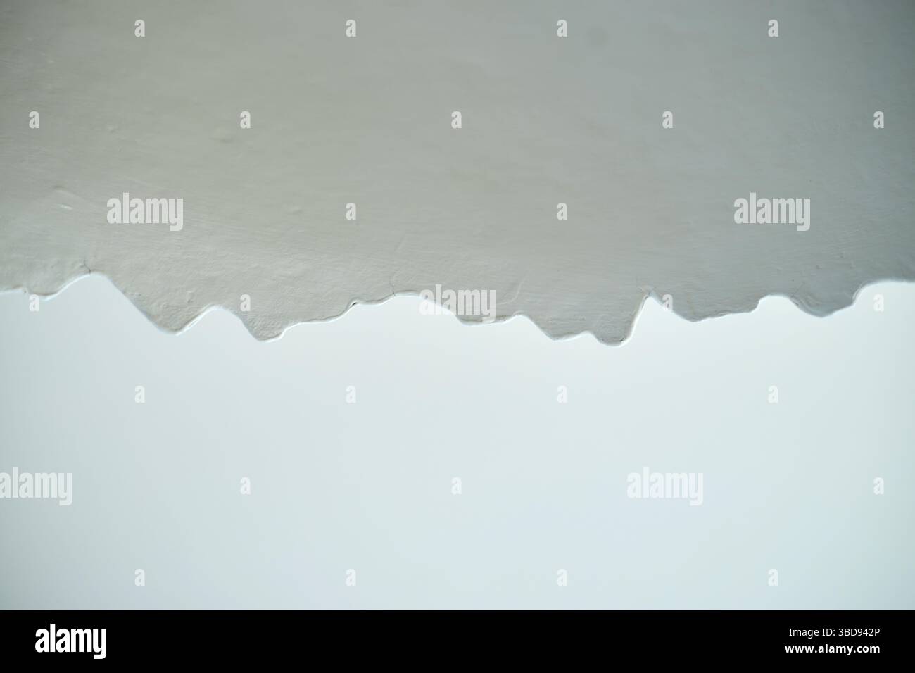 Close-up view showing serrated edge of a metal object with smooth ...