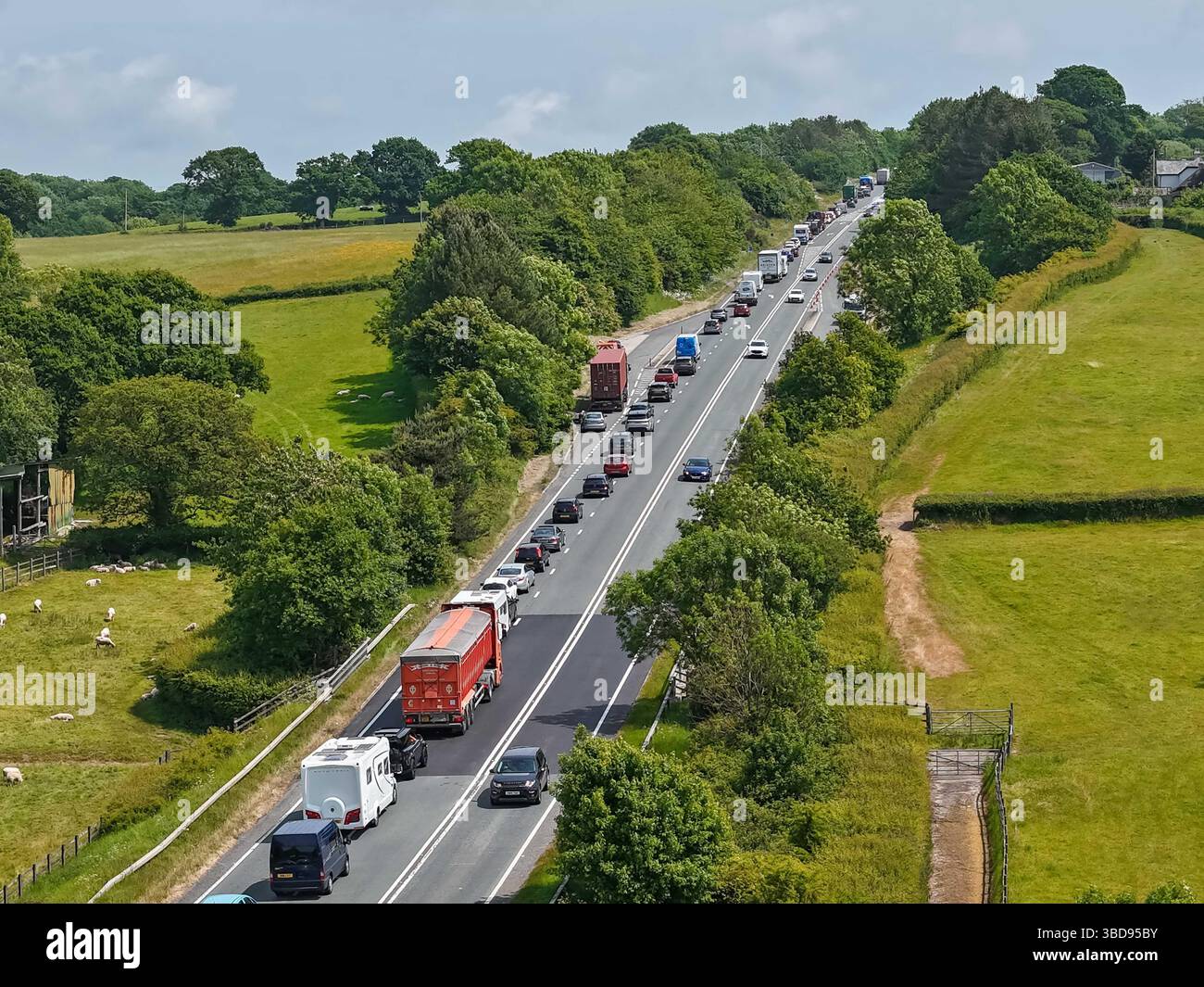 Axminster, Devon, UK. 23rd May 2025. UK Weather. Huge queues stretching ...