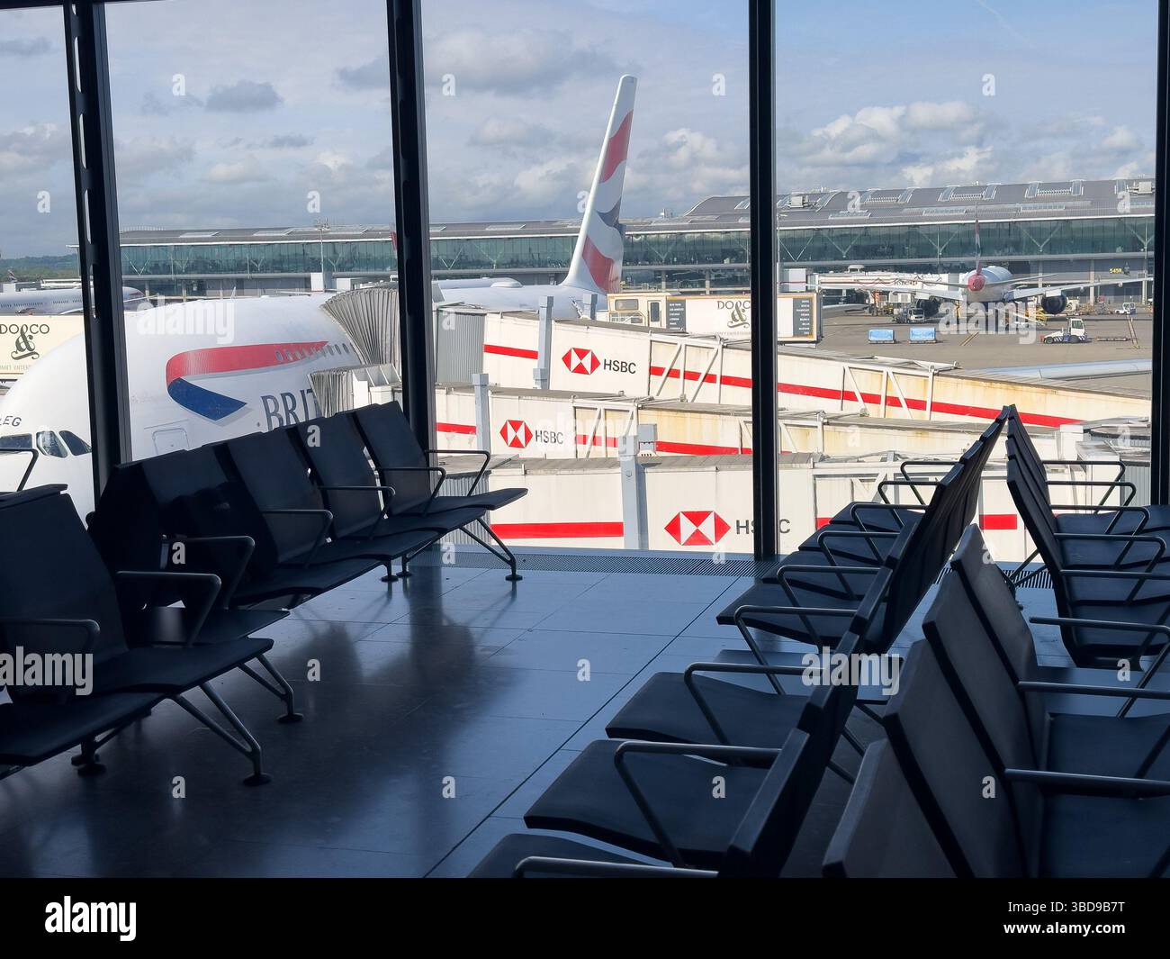 12 MAY 2025 - London, UK - Heathrow Airport Terminal 5 with HSBC ...